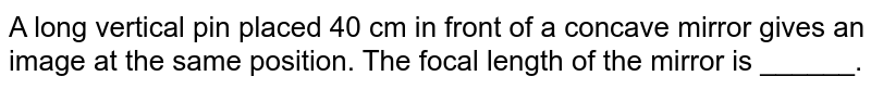 A 10 mm long awl pin is placed vertically in front of a concave mi